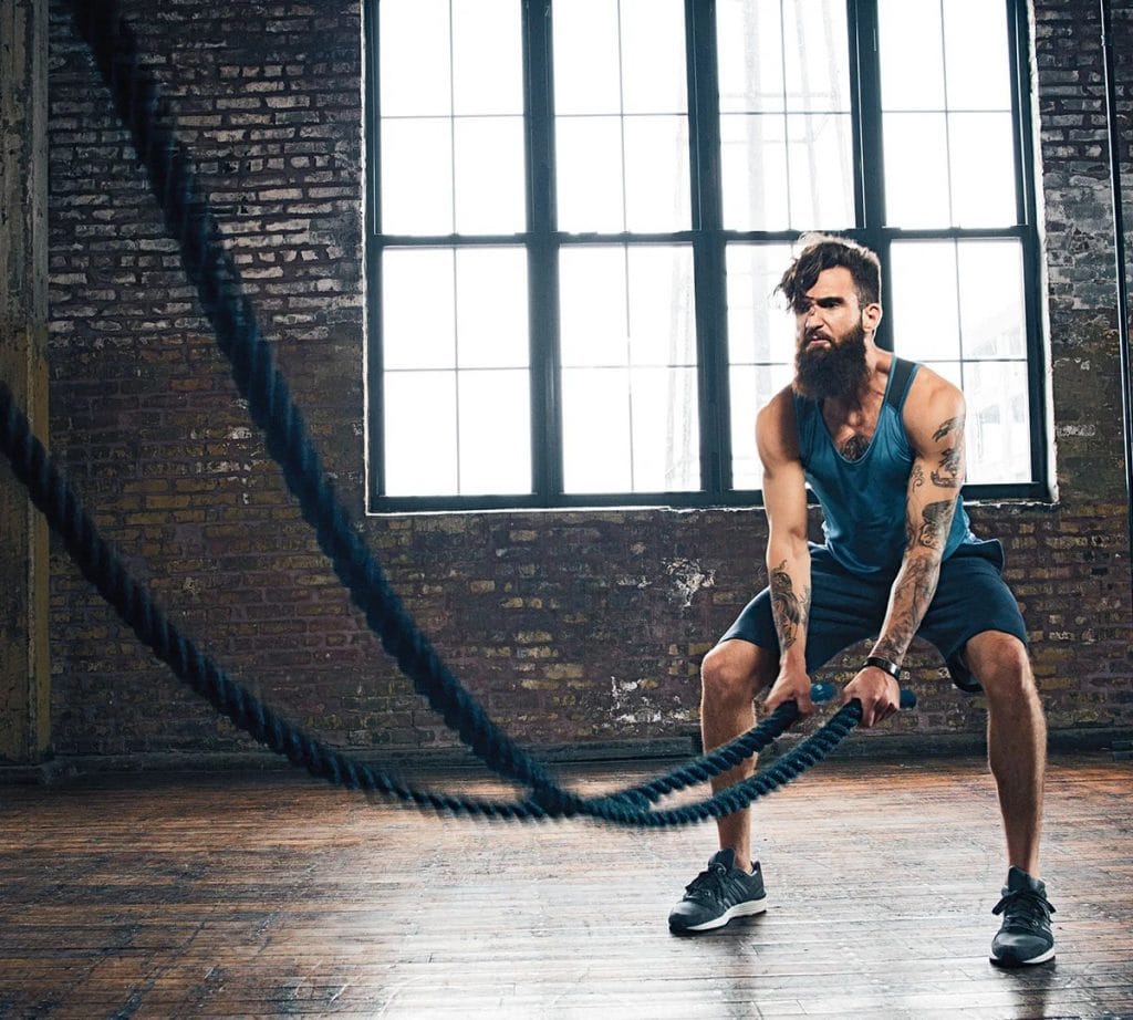 20 HIIT Battle Rope Workouts (And How To Do Them Properly)