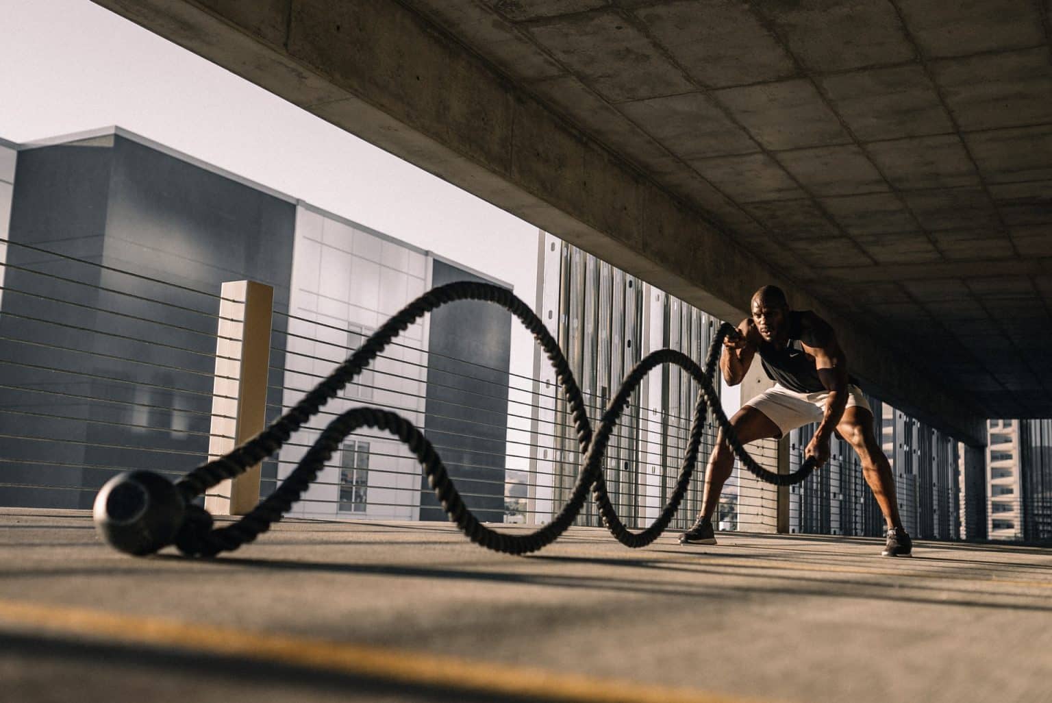 20 HIIT Battle Rope Workouts (And How To Do Them Properly)