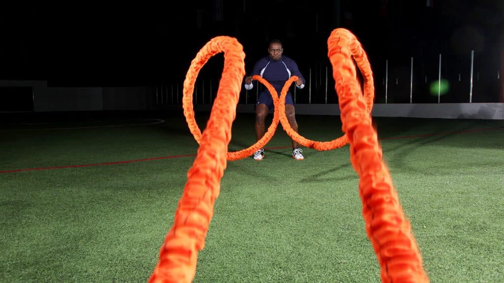 20 HIIT Battle Rope Workouts (And How To Do Them Properly)